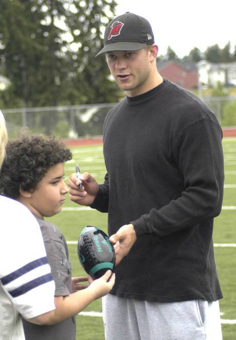 Jake Locker, Cody Habben appear at Panther youth football camp ...